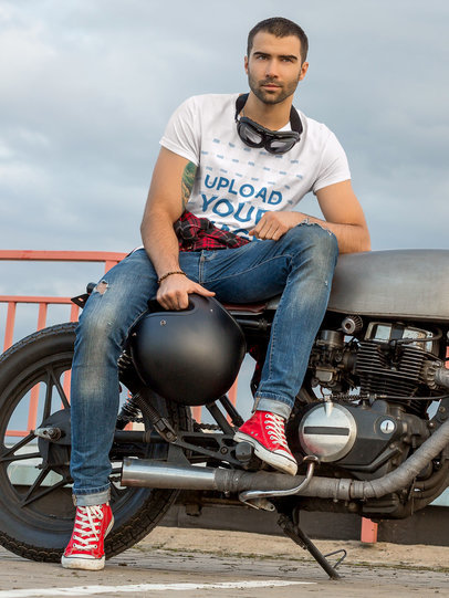 Placeit - T-Shirt Mockup of a Stylish Man Posing in front of His Motorcycle