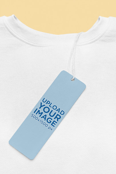 Placeit - Brand Tag Mockup Featuring a Rack of Crewneck Sweatshirts