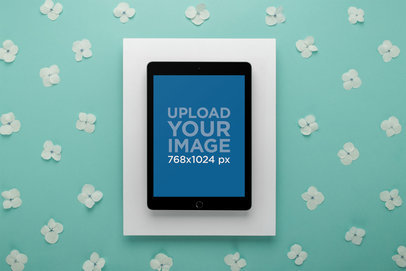 Placeit - Mockup of an iPad Laying Next to Pretty Flowers Over ...