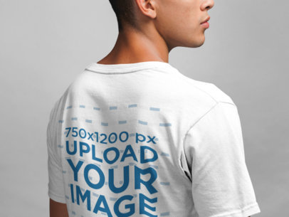 Placeit - Back View T-shirt Mockup Featuring a Man With a Buzz Cut