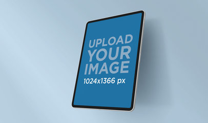 Placeit - Mockup of a Slightly Angled iPad Pro Floating Over a Colored ...