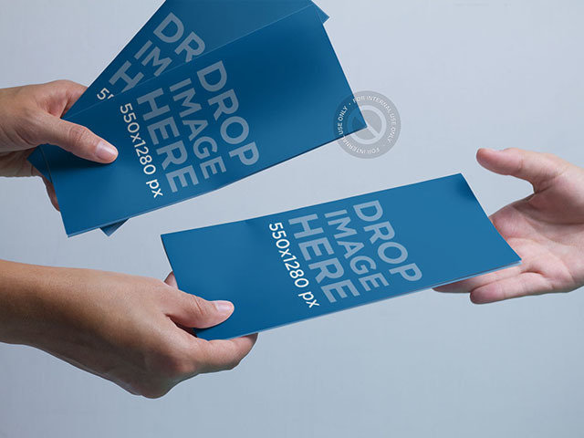 Placeit - Brochure Mockup Featuring a Person Handing Out Brochures