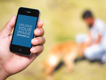 Placeit - Mockup of Someone Using an iPhone 5