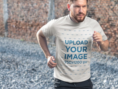 Placeit - Fitness T-Shirt Mockup Featuring an Athletic Handsome Man Jogging
