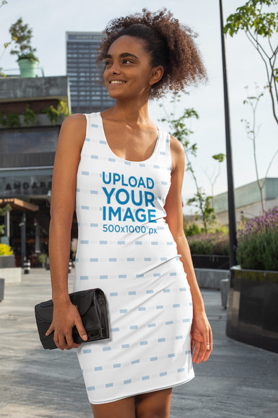 Placeit - Mockup of a Trendy Woman Wearing a Racerback Dress in the Street