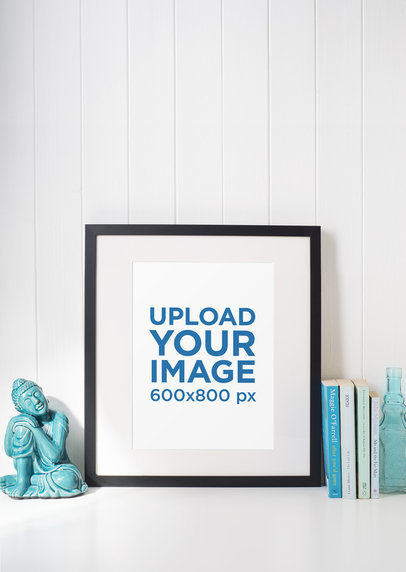 Placeit - Picture Frame Mockup Against a Minimalistic Striped Wall