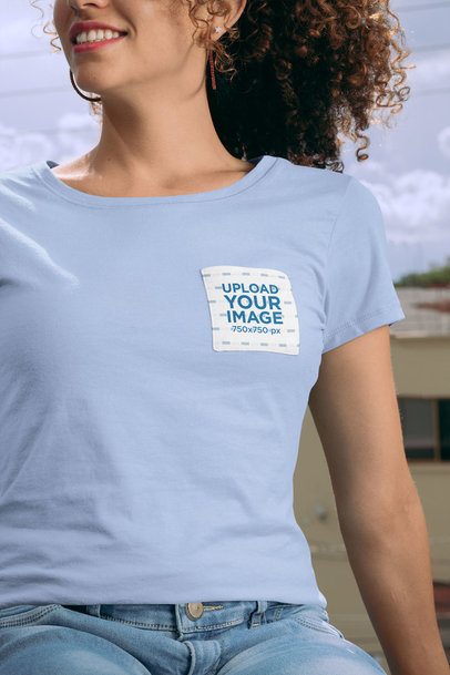 Placeit - Pocket Tee Mockup of a Woman with Natural Hair Smiling