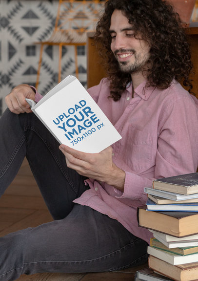 Placeit - Hardcover Book Mockup Featuring a Bearded Man Reading