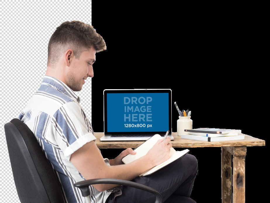Placeit - MacBook Mockup of a Man Writing in His Notebook