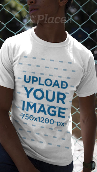 Placeit - Stop-Motion T-Shirt Video Featuring a Man in a Basketball Court