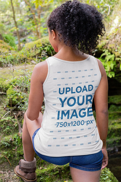 Placeit - Back View Mockup of a Woman with a Tank Top at a Gym