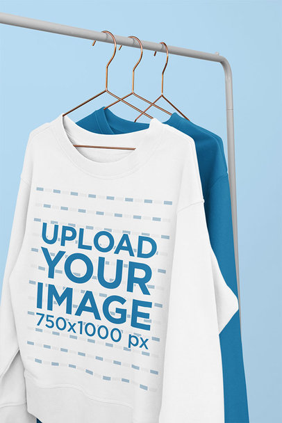 Placeit - Crewneck Sweatshirt Mockup Hanging from a Copper Clothing Rack