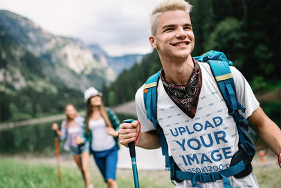 Placeit - T-Shirt Mockup of a Man Leading a Hike with Friends