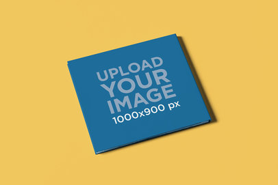 Placeit - Minimal Digipak Mockup Featuring a Solid Color Backdrop