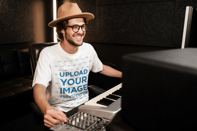 Placeit - Mockup of a Male Singer Wearing a T-Shirt in a Studio