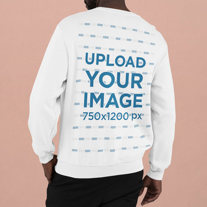 Placeit - Back View Mockup of a Happy Man Wearing a Hoodie at a Studio