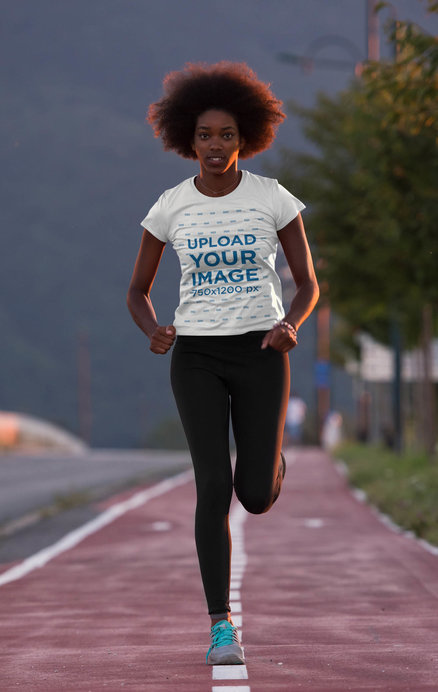 Placeit - Activewear T-Shirt Mockup of a Young Woman Running