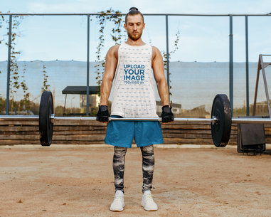 Placeit - Tank Top Mockup Featuring a Muscular Man Leaning Against a Wall