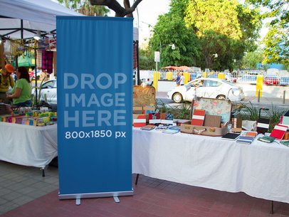 Placeit - Banner Mockup in a Stand at a Local Market