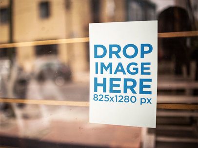 Placeit - Mockup of a Flyer on a Window